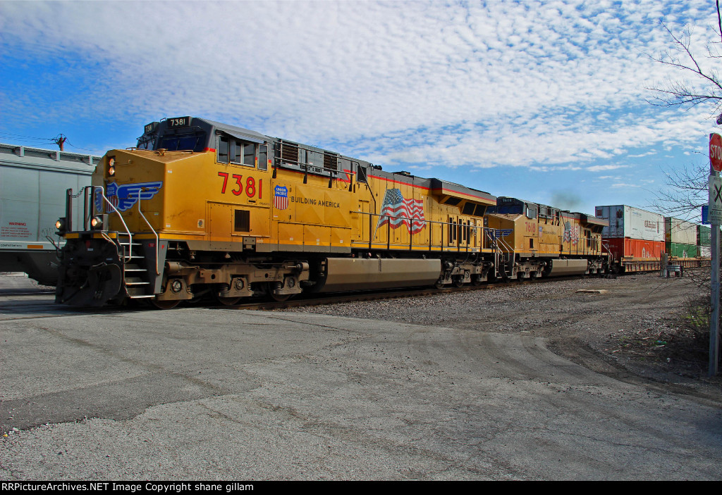 UP 7381 takes a stack train Nb Up the Chester sub.